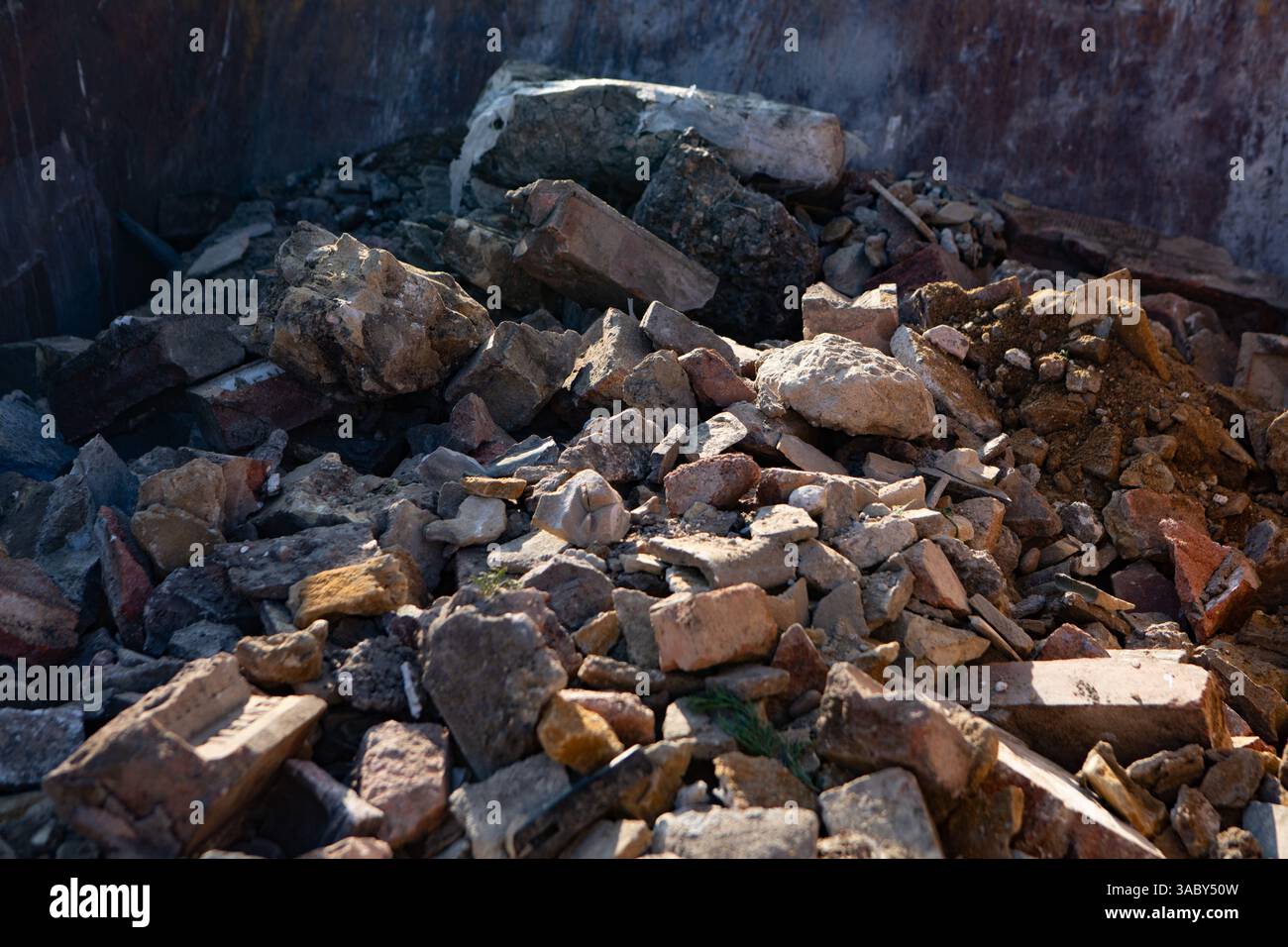 bricks, rubble and hardcore in a skip Stock Photo - Alamy