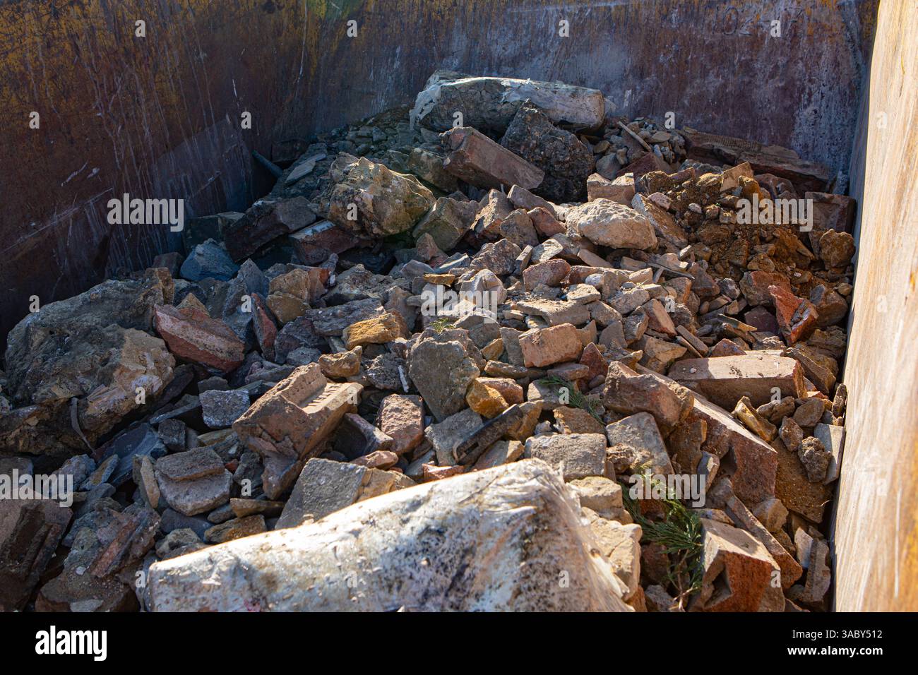 bricks, rubble and hardcore in a skip Stock Photo - Alamy
