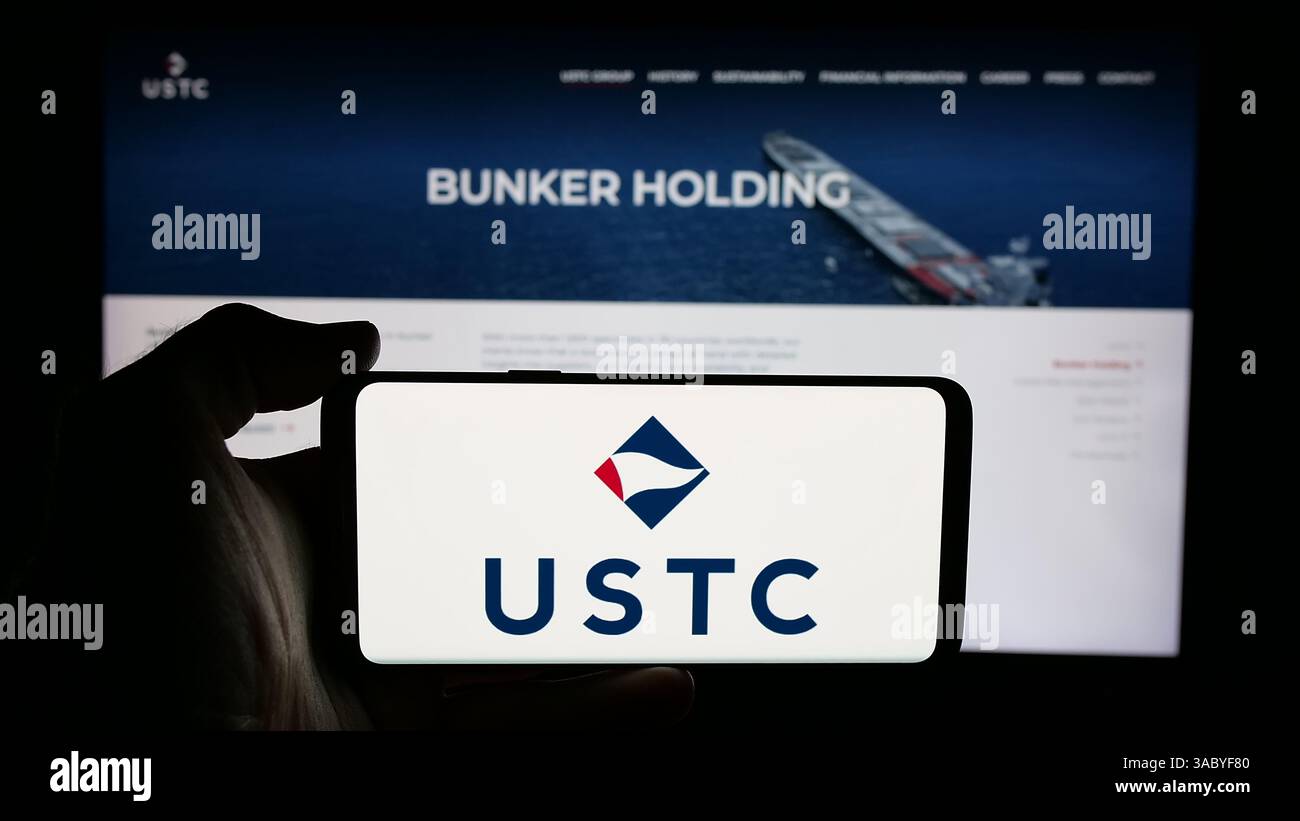 In this photo illustration, a cellphone with the logo of Danish ...