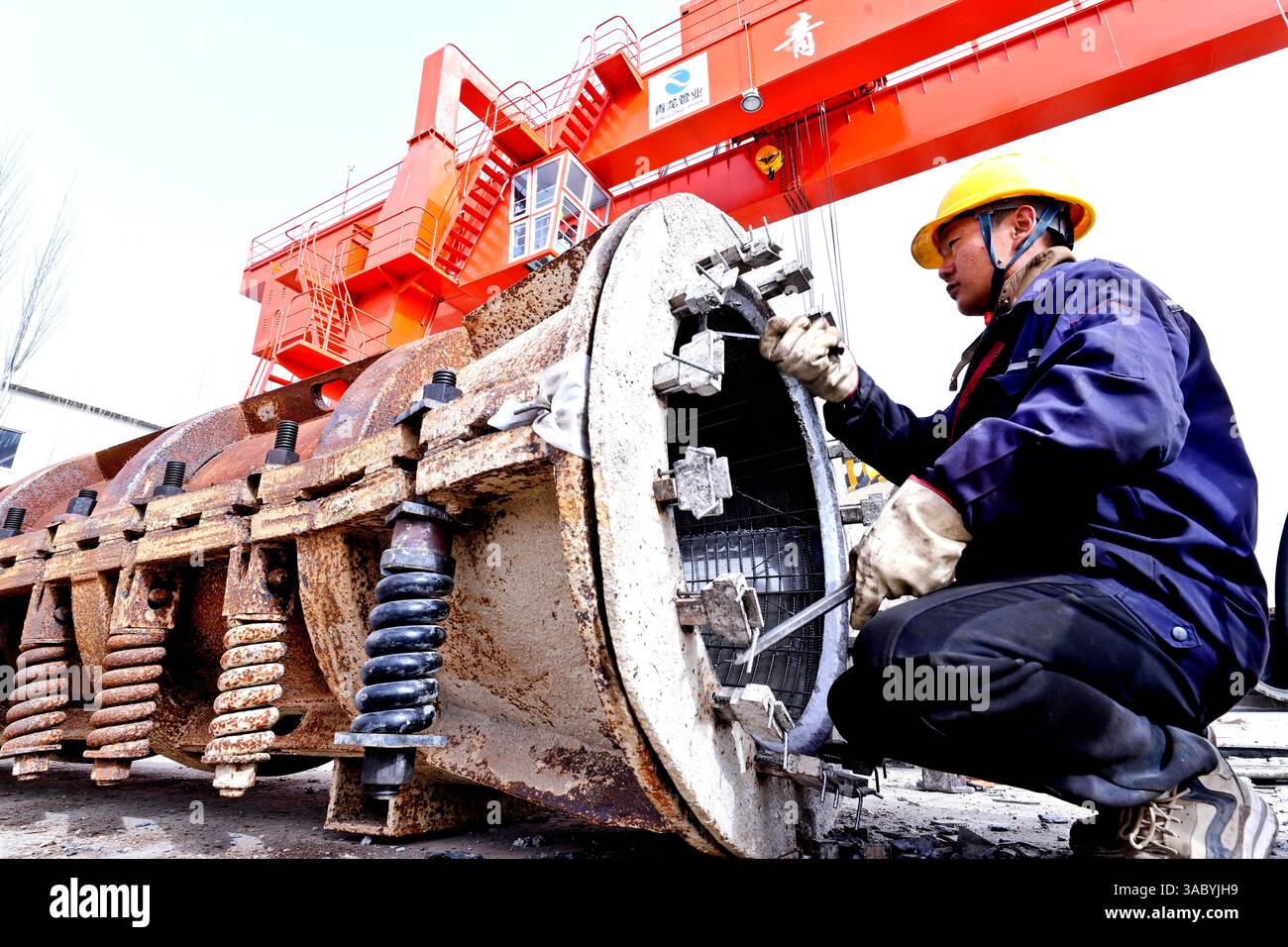 ZHANGYE, CHINA - APRIL 2, 2025 - Workers carry out PCP pipeline mold ...