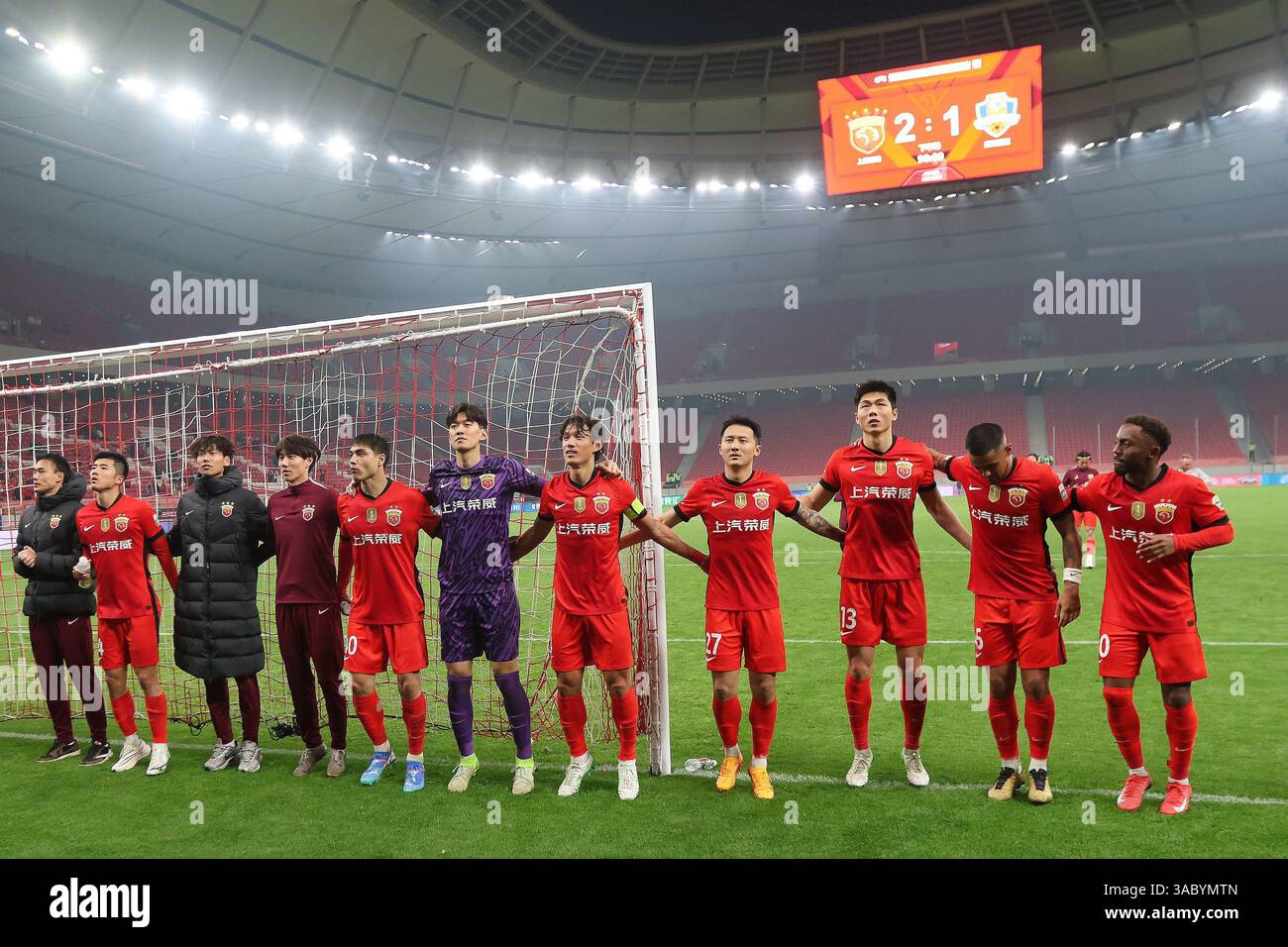 Shanghai Port Football Club defeated Meizhou Hakka Football Club with 2 ...