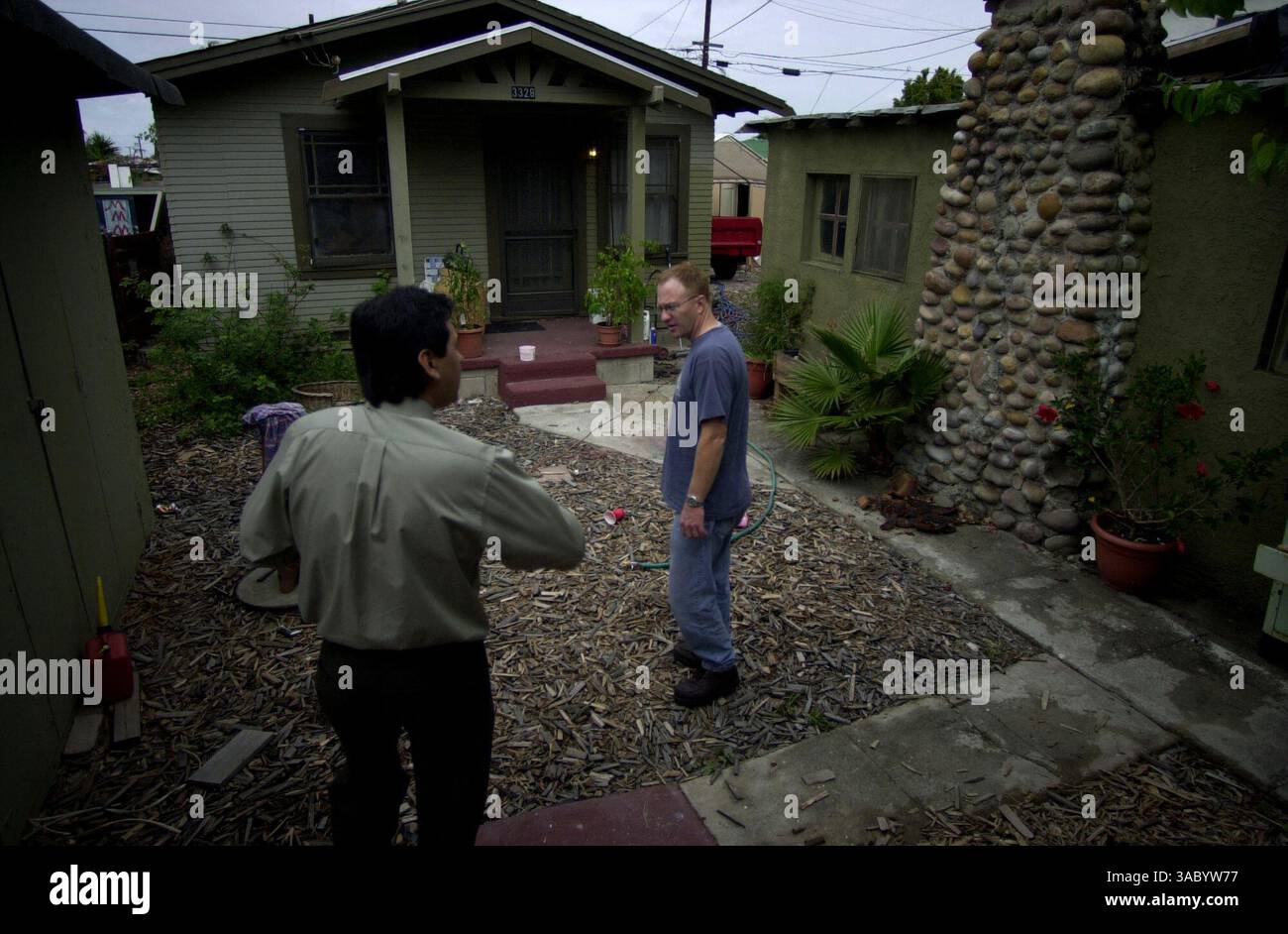 (Published 08/03/2003, A-9): Thomas Lovell, right, shows Joseph Aubin ...