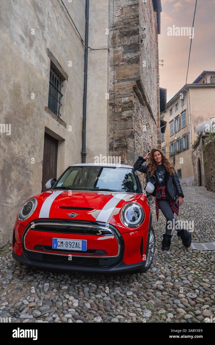 Red Mini Cooper on Cobblestone Street in Old Town Bergamo, Italy Stock ...