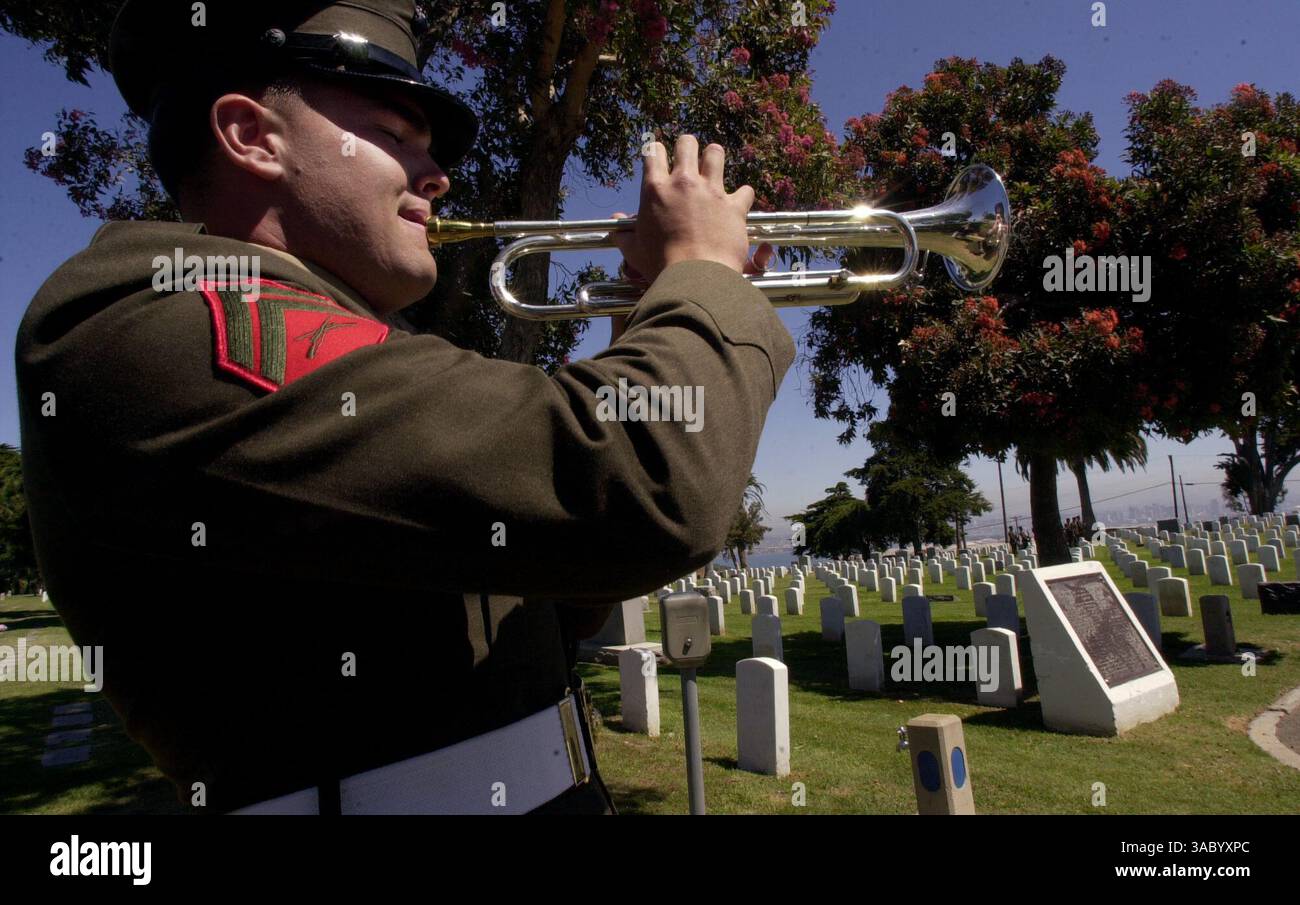 (Published 04/12/2003, A-1 refer and E-1) Corporal Jordan Johnson plays ...