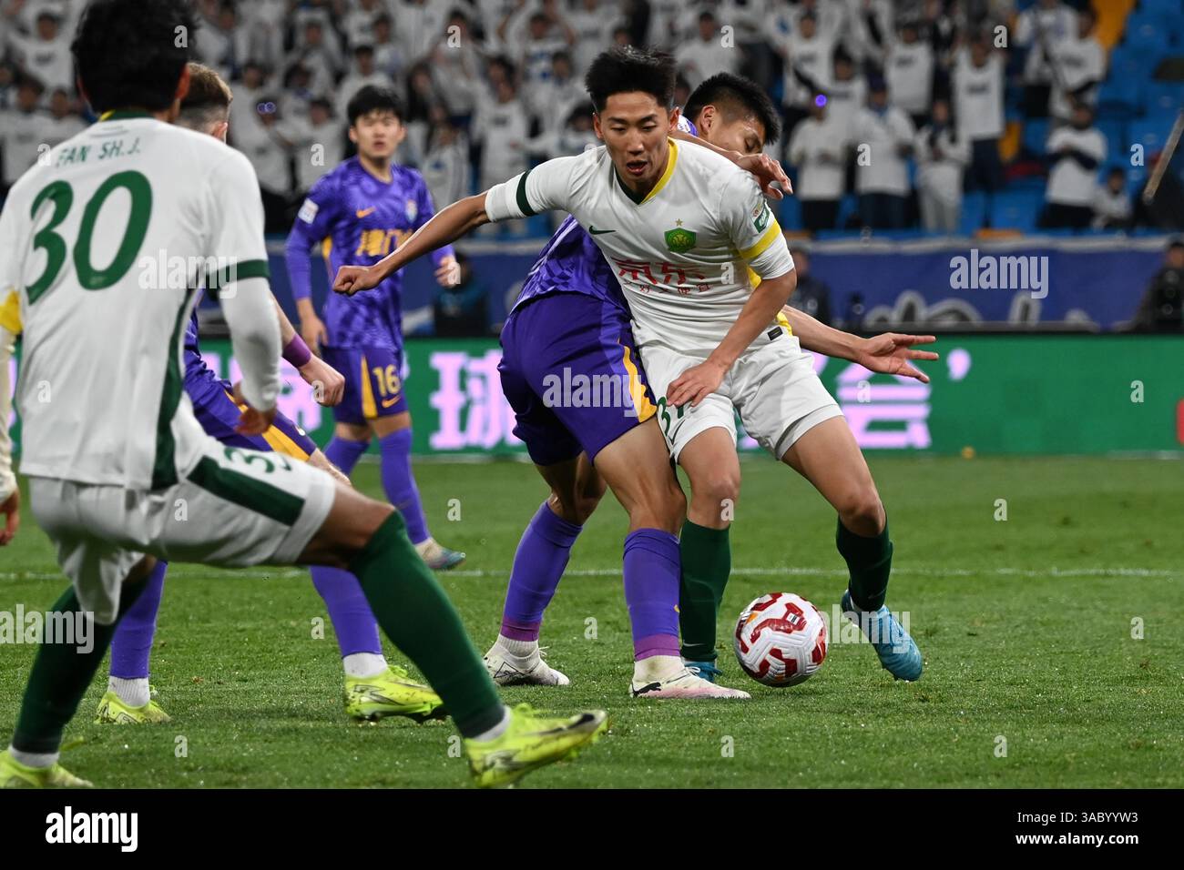 Tianjin Jinmen Tiger Football Club 2-2 draw Beijing Guoan Football Club ...