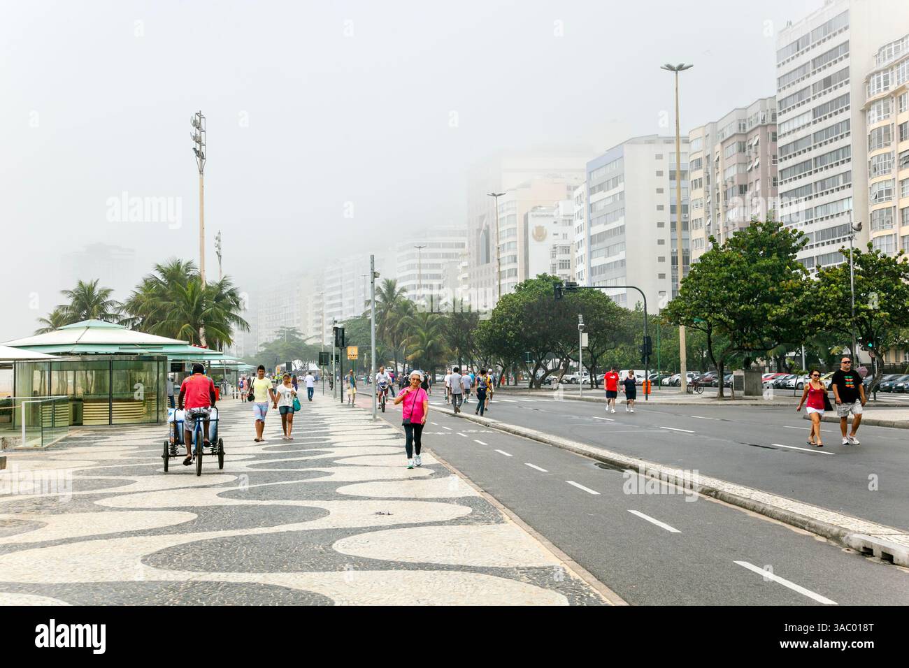 Buildings in the fog along Avenida Atlantica, Copacabana Beach ...