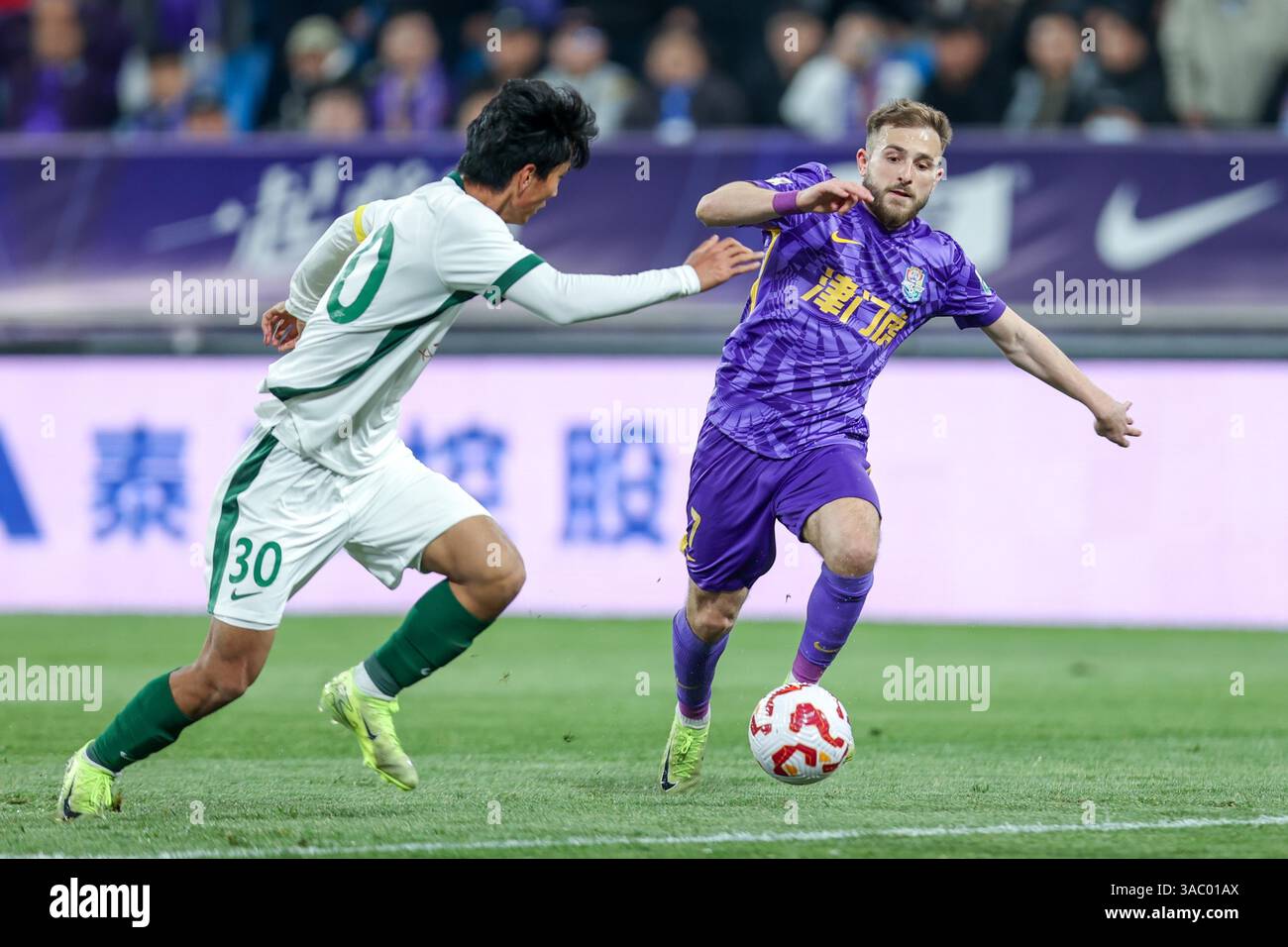 Tianjin Jinmen Tiger Football Club 2-2 draw Beijing Guoan Football Club ...