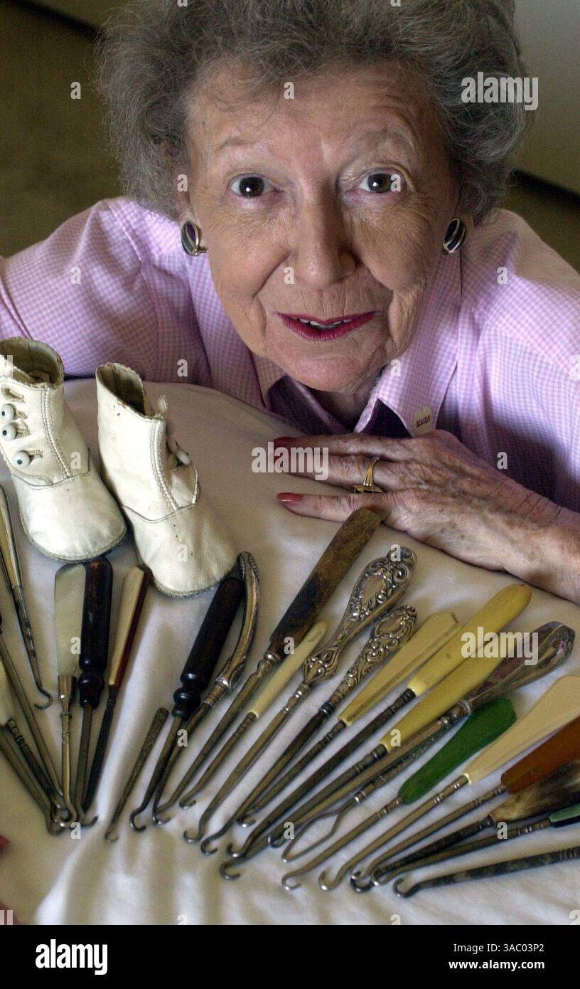 (Published 03/08/2003, NI-4) Ruth Shelton, 84, sits with part of her collection of shoe button ...