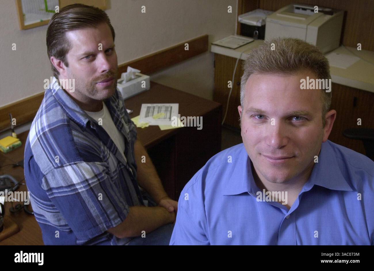 (Published on 11/27/2004, NC-3, NI-3) Sheriffs Deputy Dan Morsch (left ...