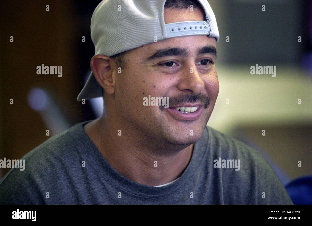 (Published 03/02/2003, E-1) Inmate ''Famous Frank'' listens to a ...