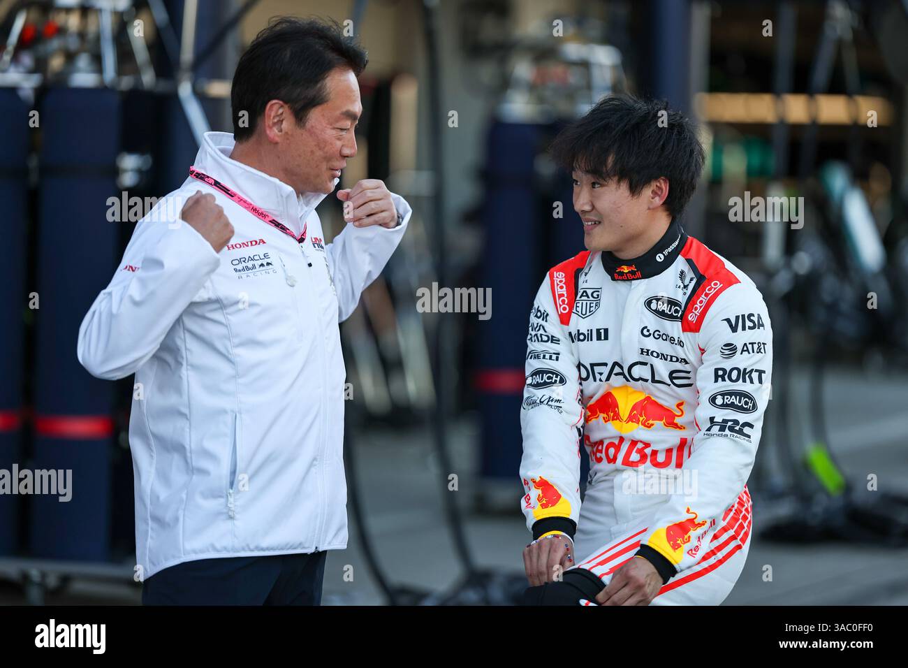 SUZUKA, JAPAN - APRIL 3: Yuki Tsunoda of Japan and Oracle Red Bull Racing talks with HRC Chief ...