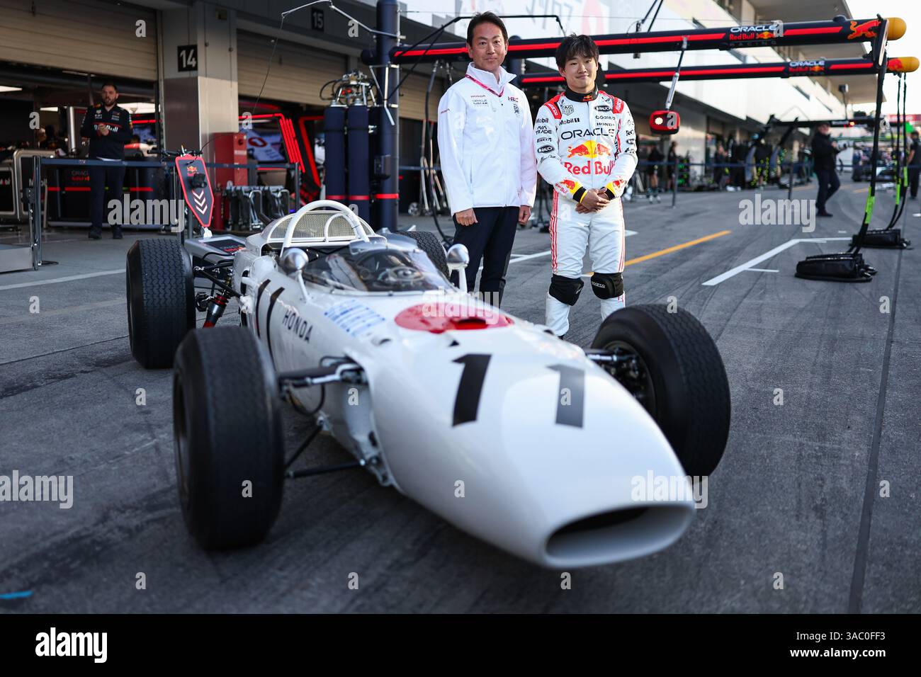 SUZUKA, JAPAN - APRIL 3: Yuki Tsunoda of Japan and Oracle Red Bull Racing and HRC Chief Koji ...