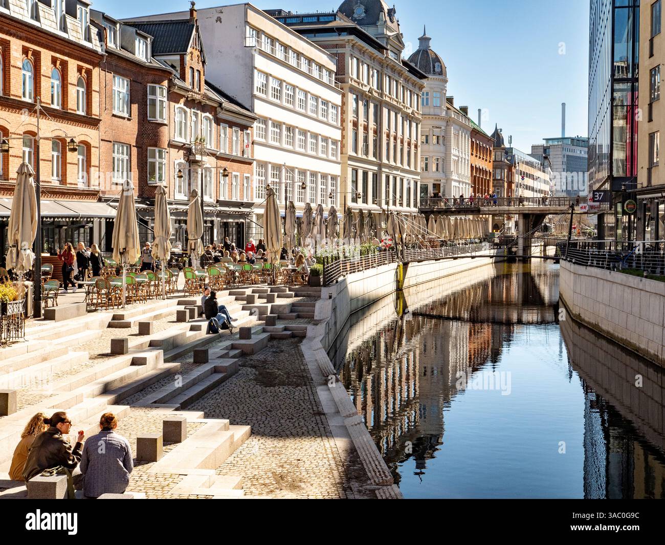 People enjoying the sun and the atmosphere in downtown Aarhus Stock ...