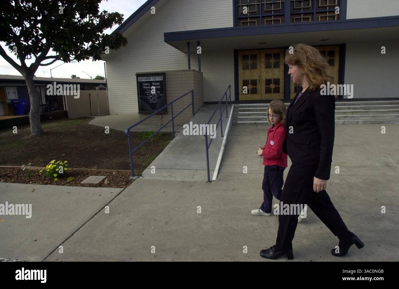 (Published 03/05/2004, B-10:7, UTS1793148) Sara Bermel, 7, passes College Center Covenant Church ...