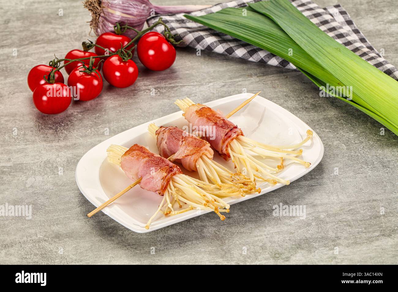 Grilled enoki mushroom with bacon roll wrap Stock Photo - Alamy