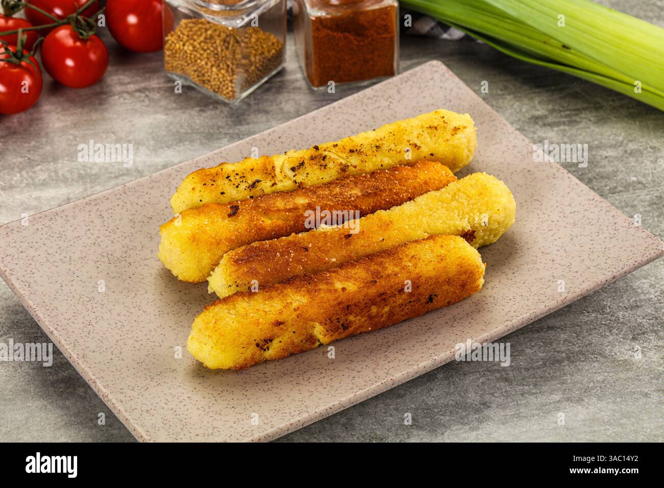 Crispy breaded mozarella cheese sticks appetizer Stock Photo - Alamy