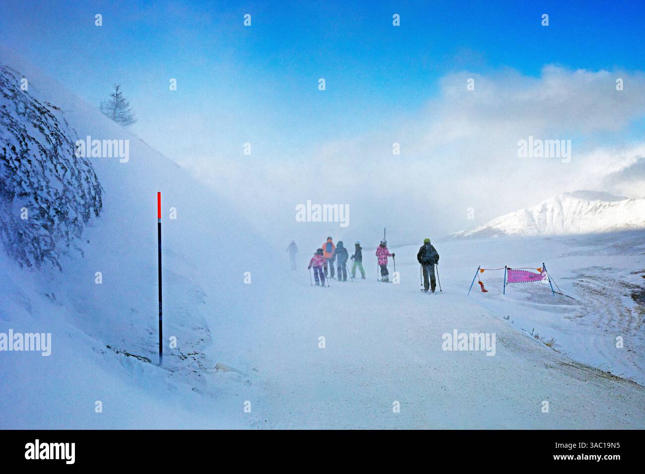 family on the slope before the descent at the Italian ski resort in the ...