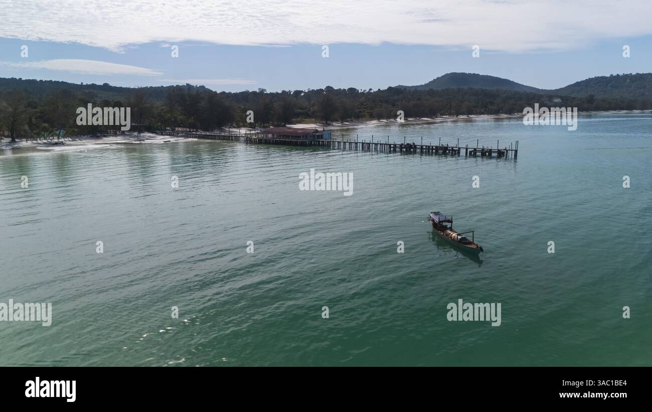 Aerial view of turquoise water and long wooden pier in Koh Rong island ...