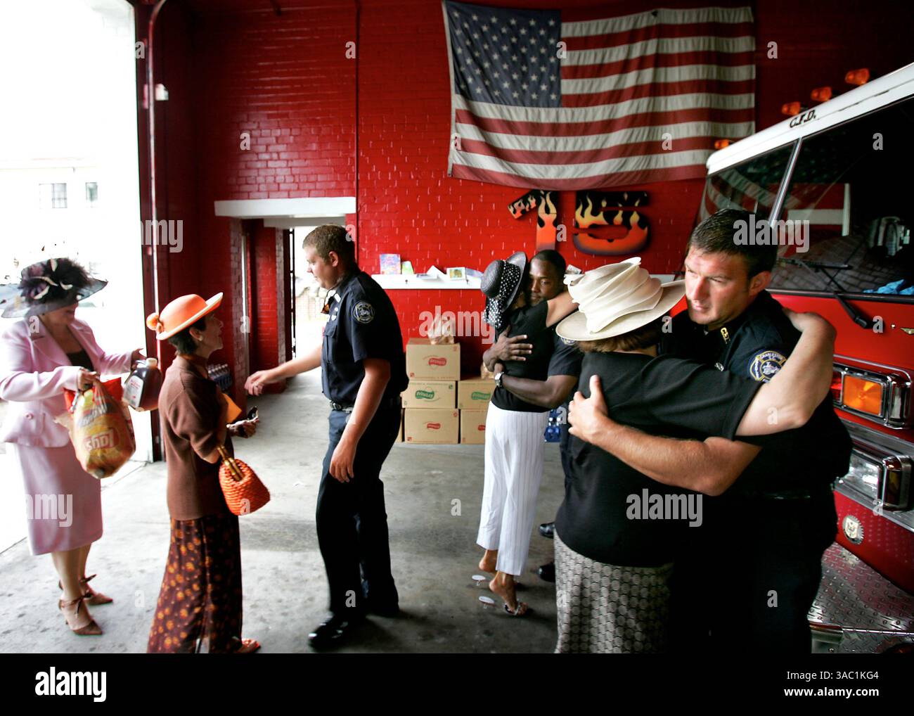 Jun 20, 2007 - Charleston, SC, USA - Firefighters get hugs from the ...