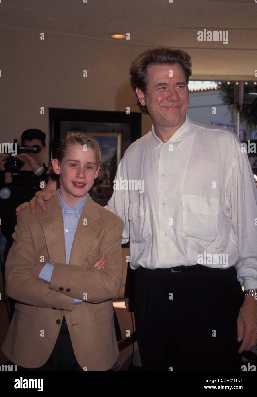 Dec 17, 1994 - Los Angeles, CA, USA - Actor MACAULAY CULKIN with JOHN ...
