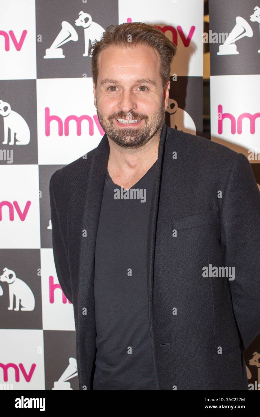 Alfie Boe signs his latest release at HMV Manchester UK Stock Photo - Alamy