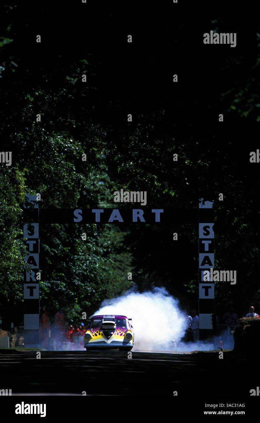 Andy Robinson (GBR) performs a tyre burnout in his 1953 Studebaker ...