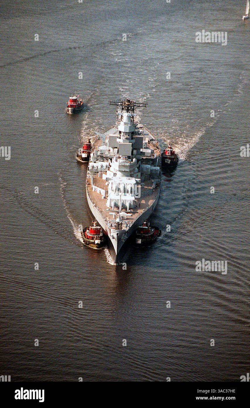 An aerial bow-on view of the battleship WISCONSIN (BB-64) being ...