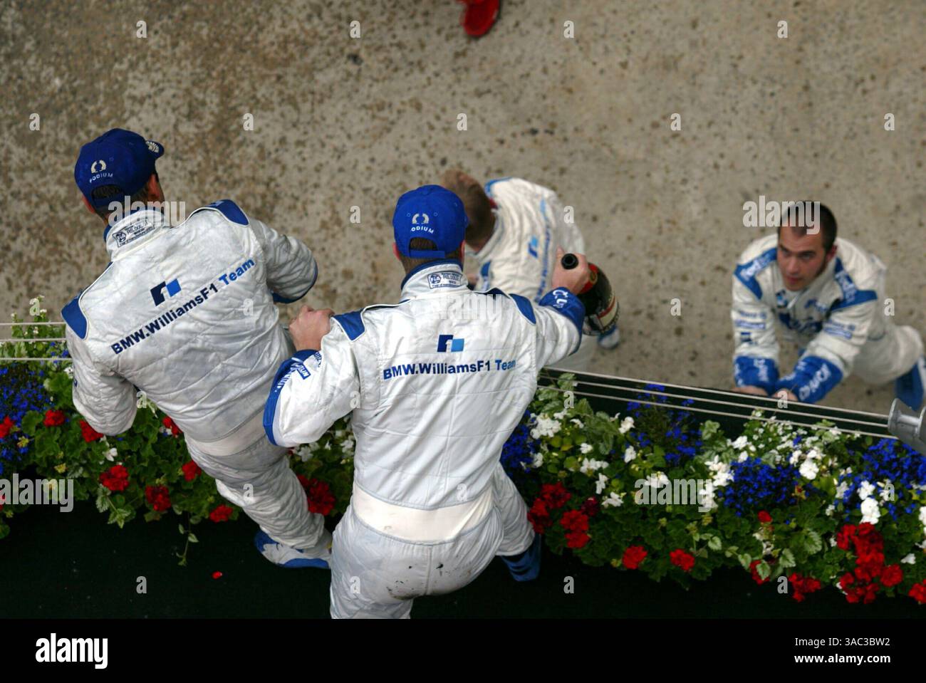 L to R): Third placed Juan Pablo Montoya (COL) Williams and second ...