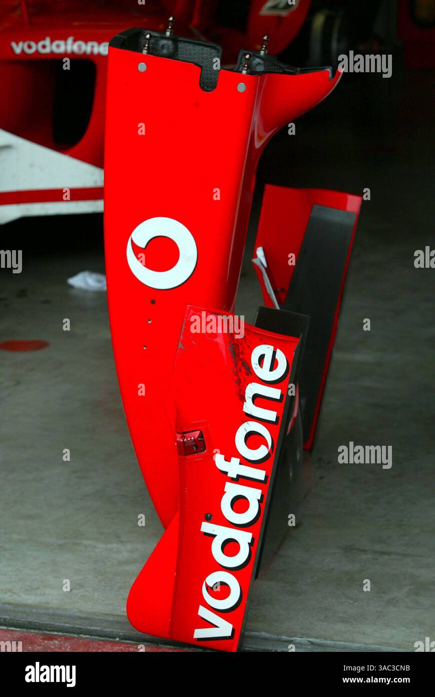 The dirty front wing of Rubens Barrichello (BRA) Ferrari after he went ...