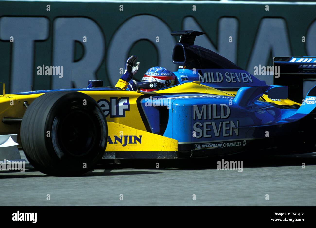 Fernando Alonso (ESP), Renault R23, crosses the line to finish third ...