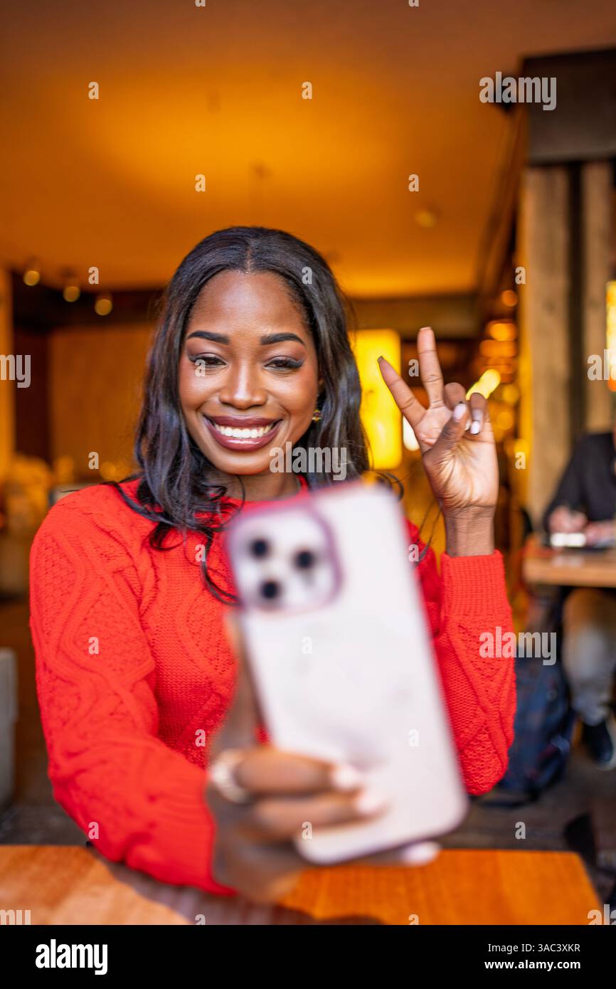 Happy customer taking a selfie with mobile phone while making the ...