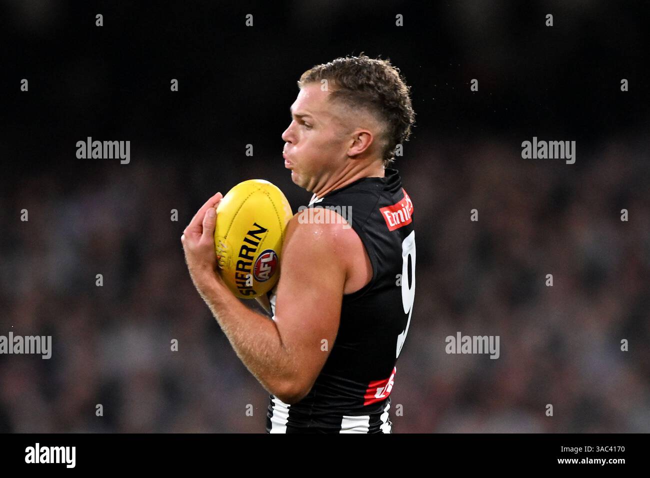 Melbourne, Australia. 03rd Apr, 2025. Dan Houston of Collingwood marks ...