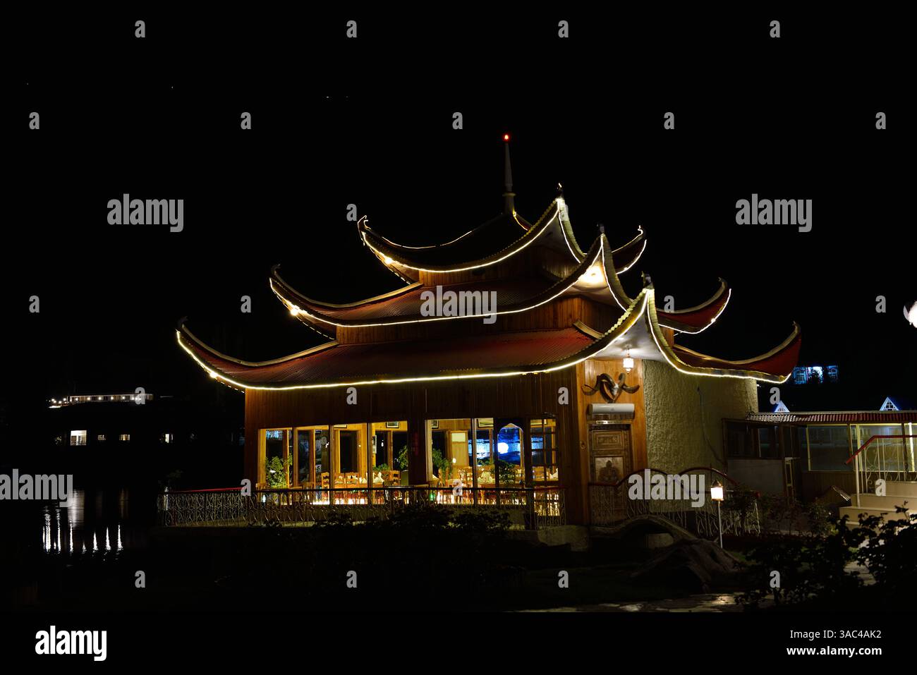 A closeup of Shangrila Resort and its illuminated Pagoda restaurant at ...