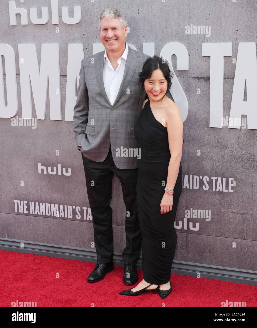 Los Angeles, USA. 02nd Apr, 2025. (L-R) Eric Tuchman and Yahlin Chang at the Hulu's THE HANDMAID ...