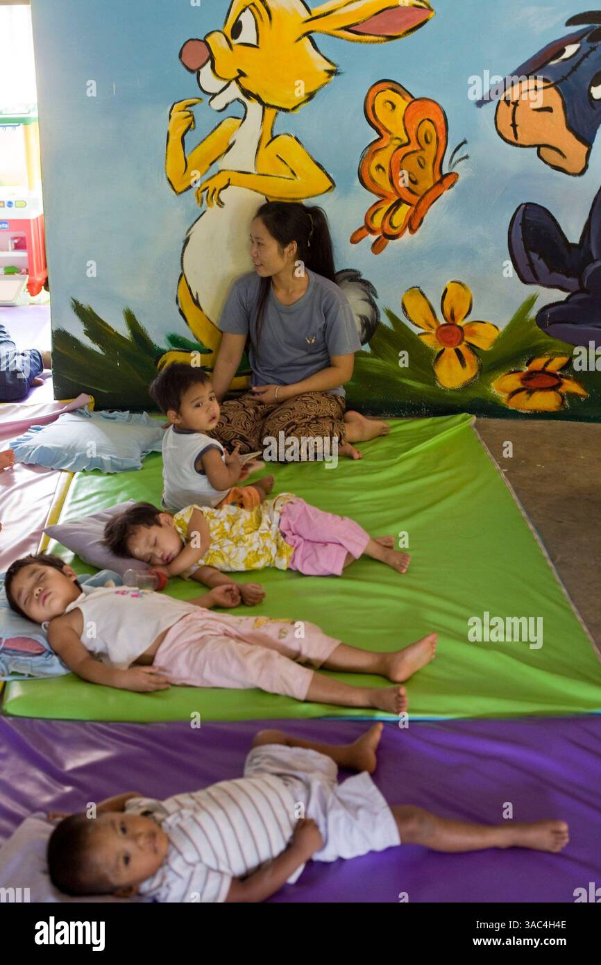 Feb 19, 2008 - Sangklaburi, Kanchanaburi, Thailand - Toddlers sleep in ...
