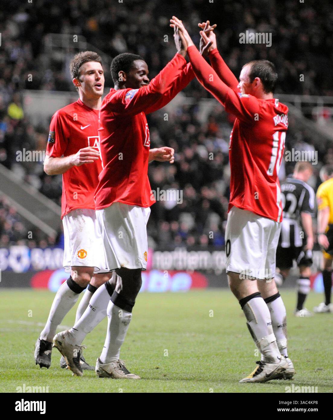 Manchester United's Louis Saha celebrates his goal with Wayne Rooney ...