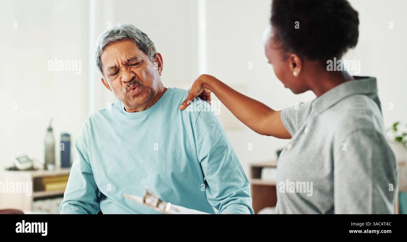 Senior man, shoulder pain and woman with physiotherapy, assessment and ...