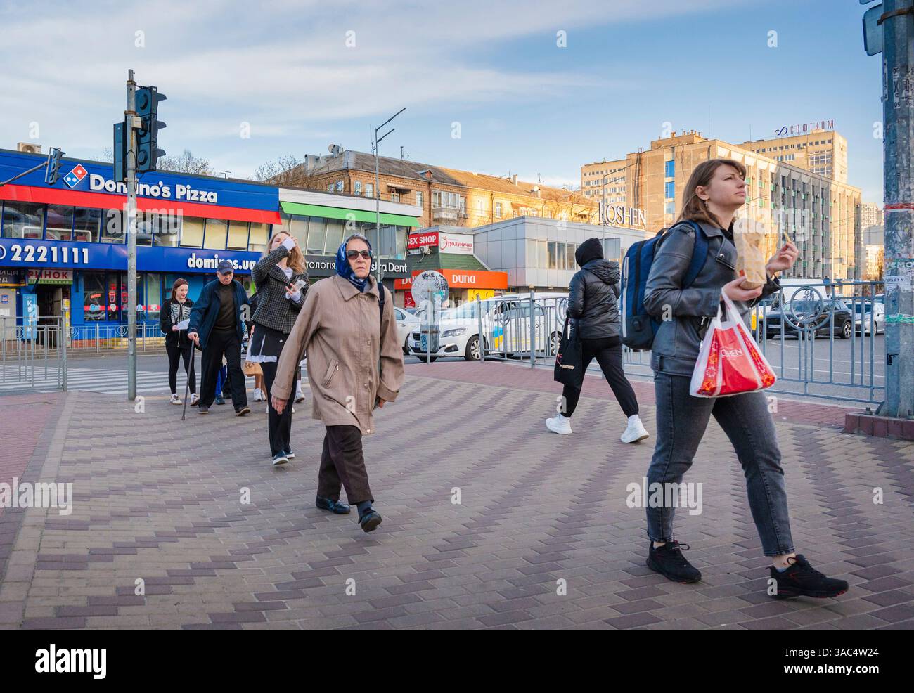 Kyiv, Ukraine - 1st April, 2025: Residents move through the ...