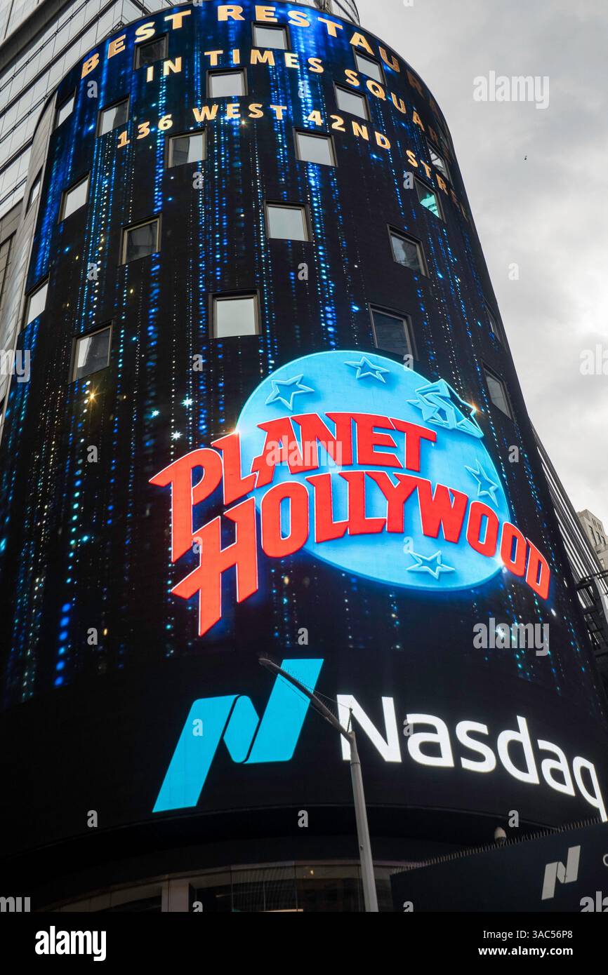 Upward View of NASDAQ Electronic Billboard in Times Square advertising ...
