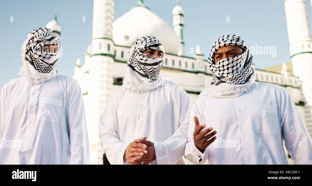 Outdoor, mosque and muslim men with faith, talking and covering face ...