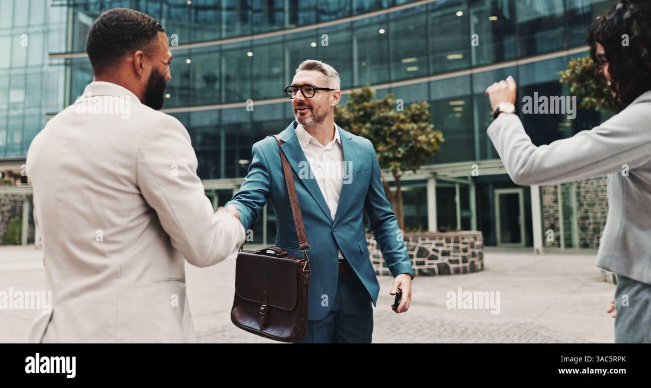 Business people, outdoor and handshake with greeting, hello and ...