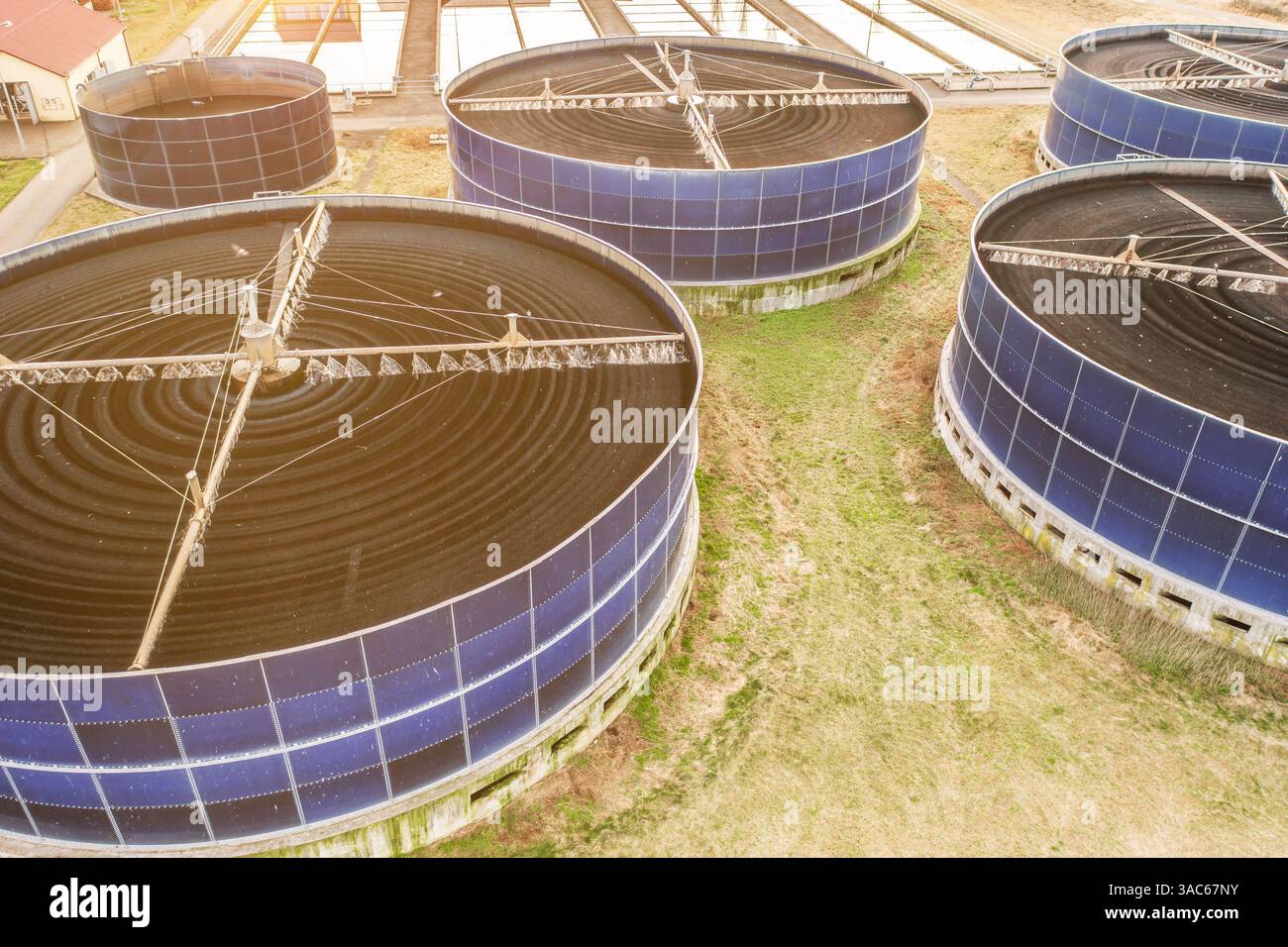 Wastewater treatment plant with circular biofilter tanks for water ...