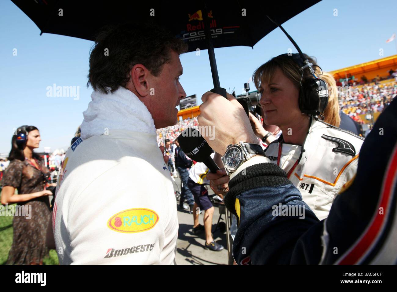 L to R): David Coulthard (GBR) Red Bull Racing is interviewed by Louise ...