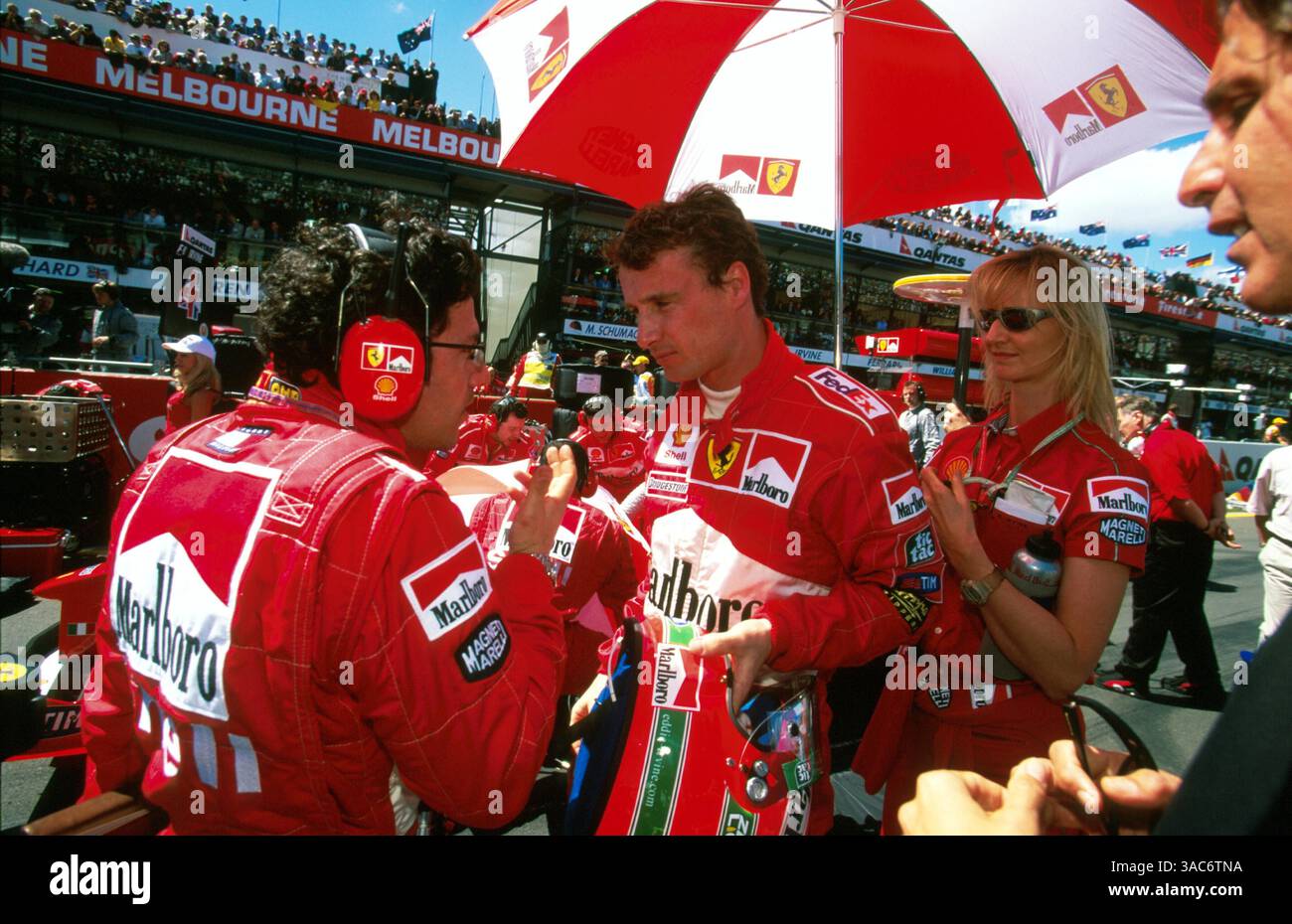 Winner Eddie Irvine(GBR) Ferrari F199 on the grid before the start ...