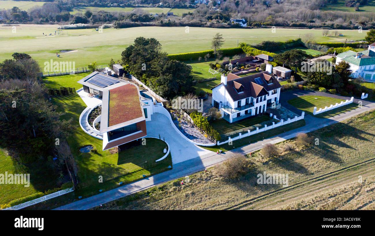 Aerial view of a new, architect-designed, ultra-modern, modern cliff ...