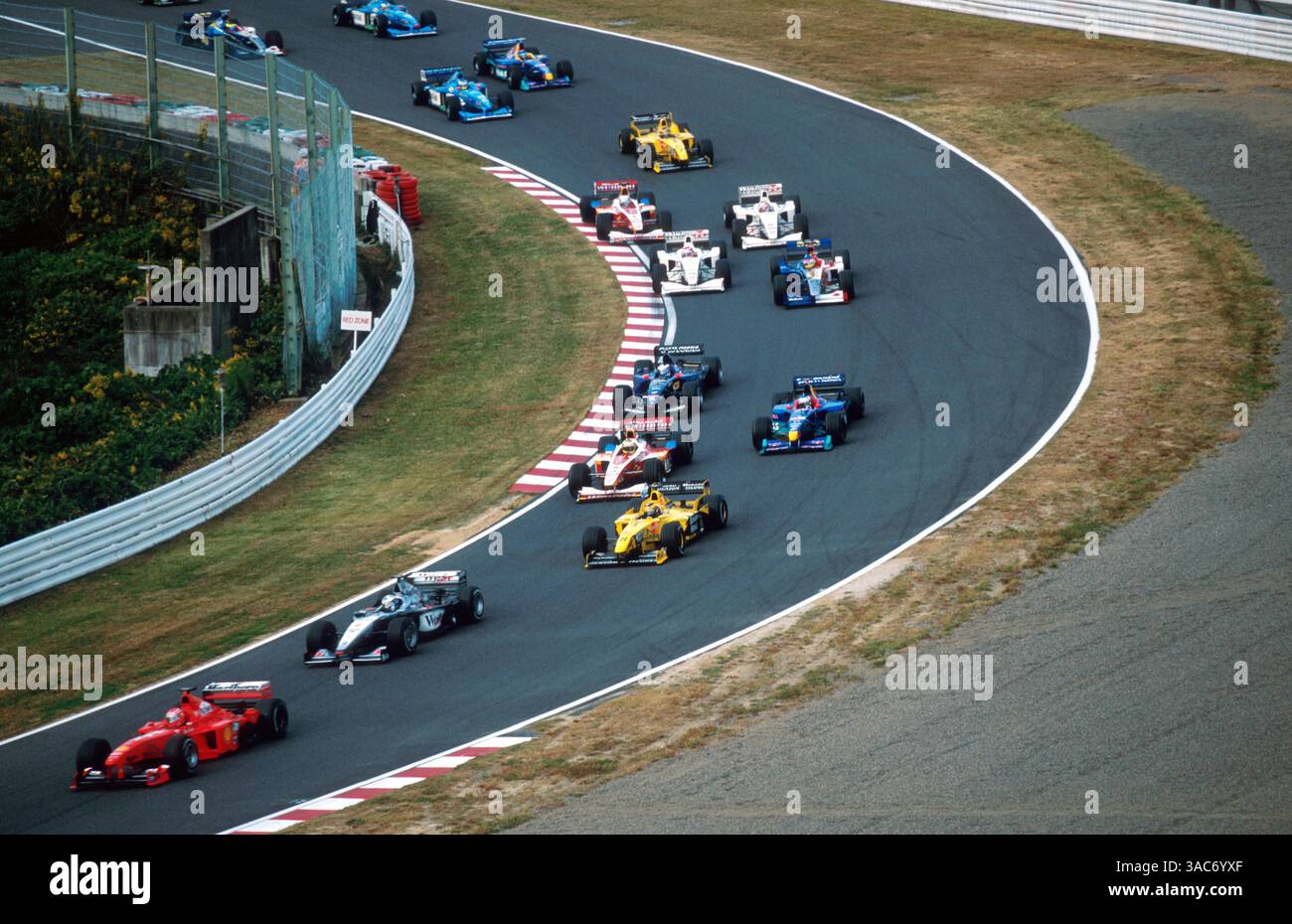 Eddie Irvine(GBR) Ferrari F399 leads the pack..Japanese GP, Suzuka, 31 ...