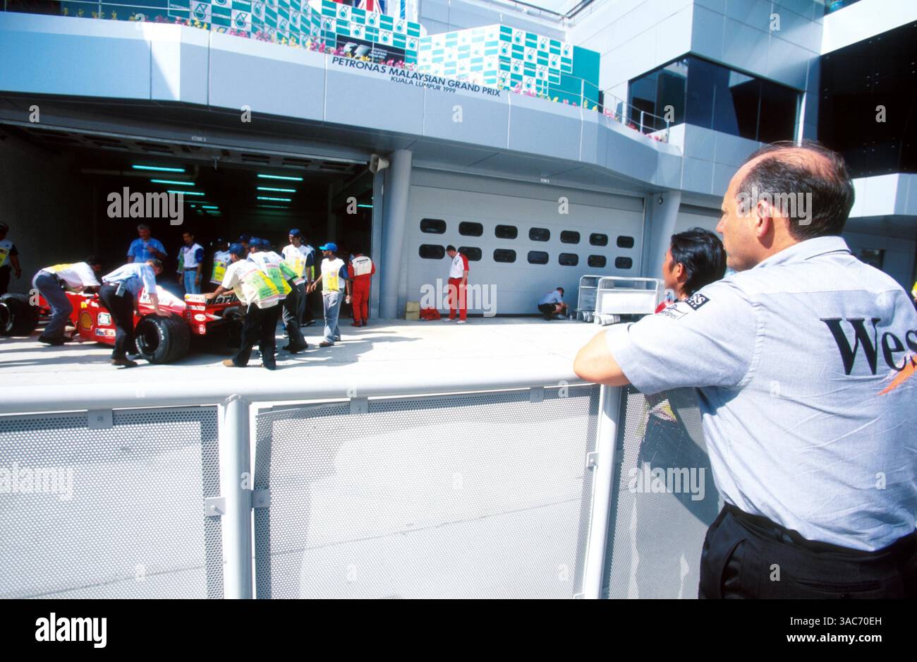 Ron Dennis(GBR) Mclaren Boss watches the scrutineeering of Ferrari ...
