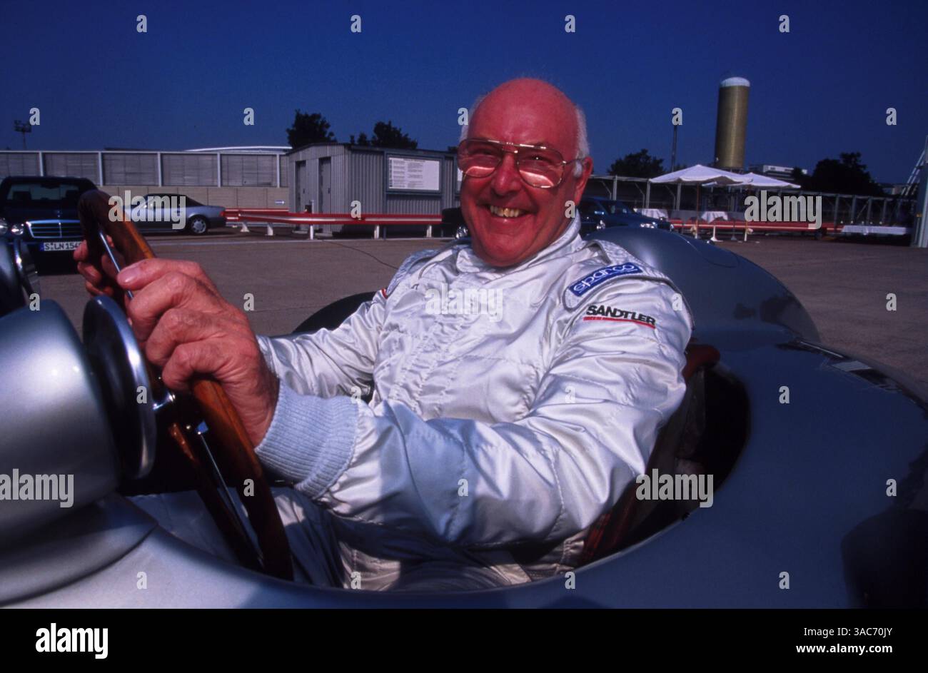 British TV commentator Murray Walker, about to test a Mercedes F1 car ...