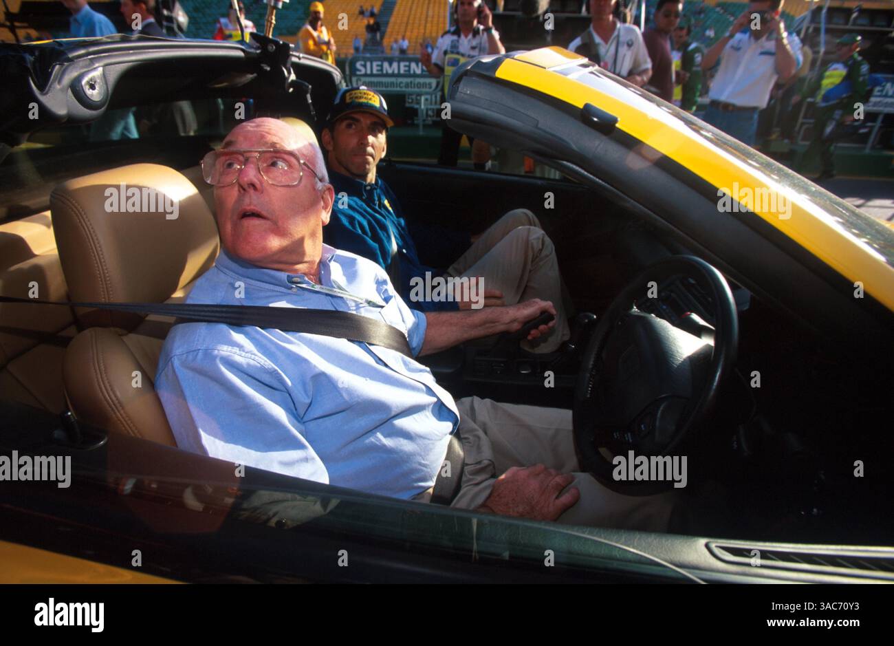 ITV F1 TV commentator Murray Walker (GBR) prepares to drive Damon Hill ...