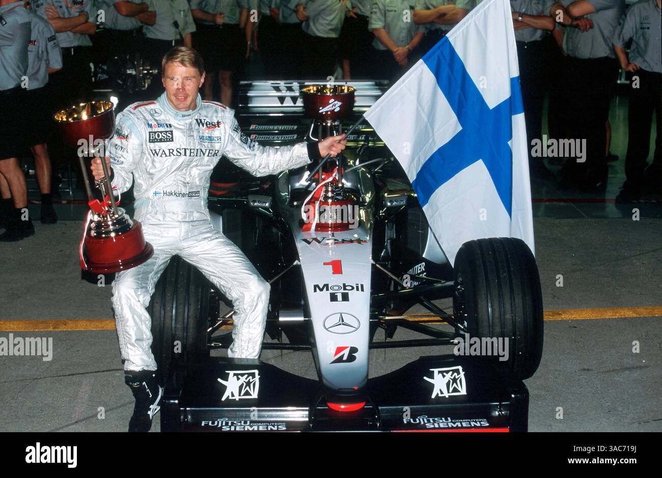 Mika Hakkinen(FIN) Mclaren MP4-14 race winner and World Champion for the second year running ...